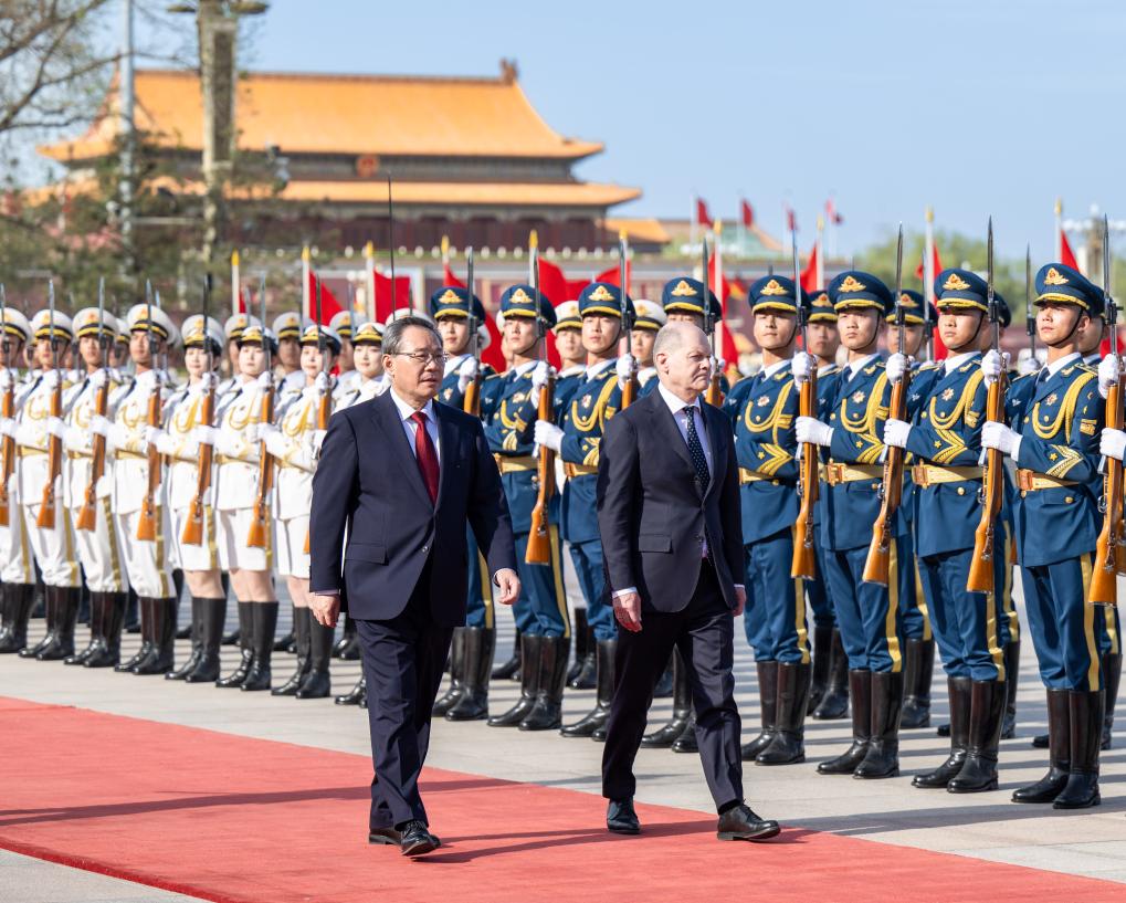 Chinese premier holds talks with German chancellor, calling for new ...
